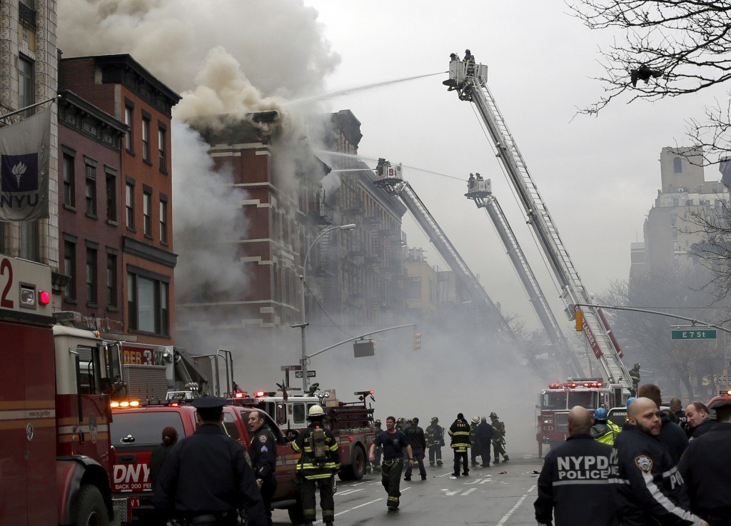 New York City building collapses, burns, injuring 12 people ...