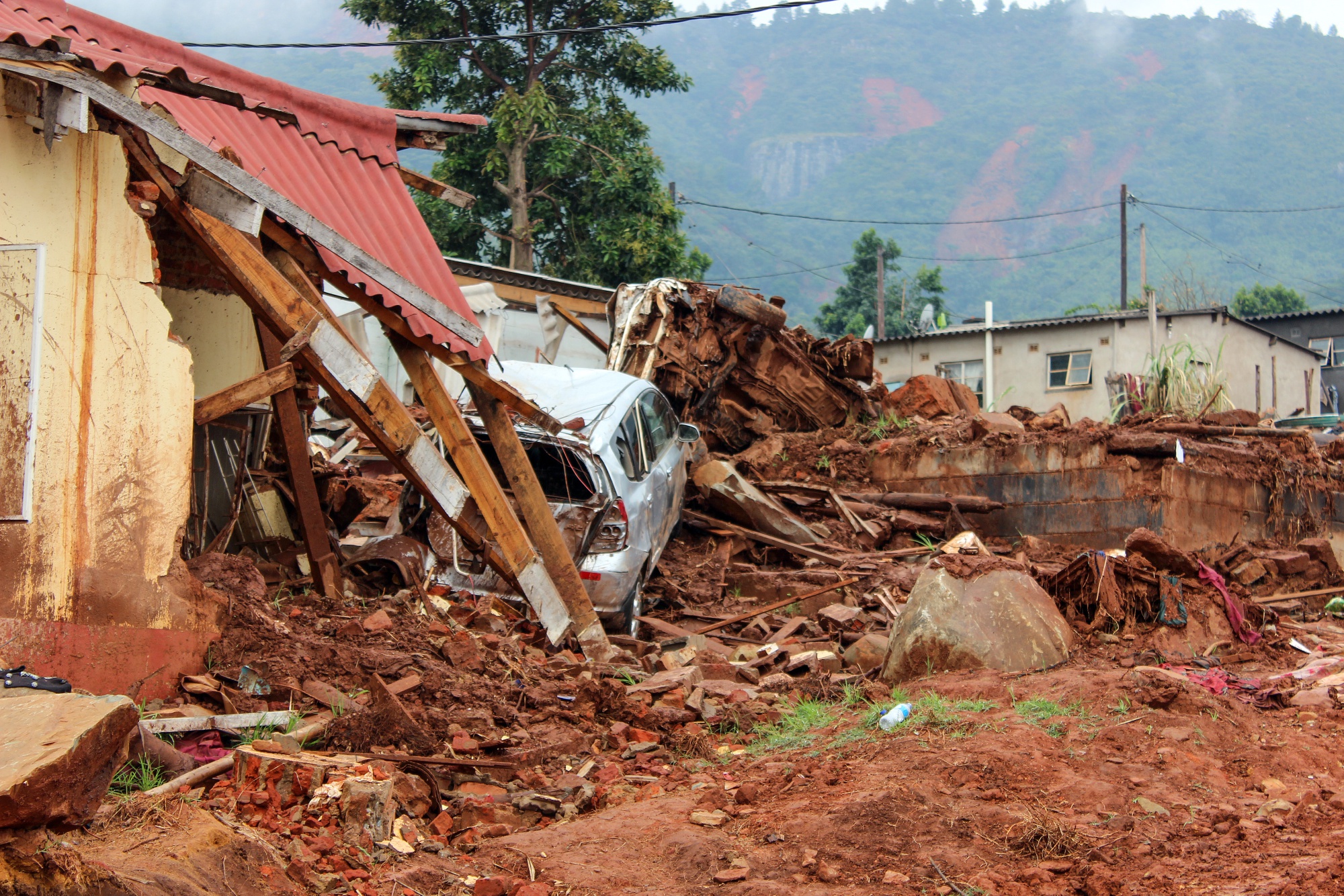 Cyclone survivors in Zimbabwe burn church pews to keep warm - Moneyweb