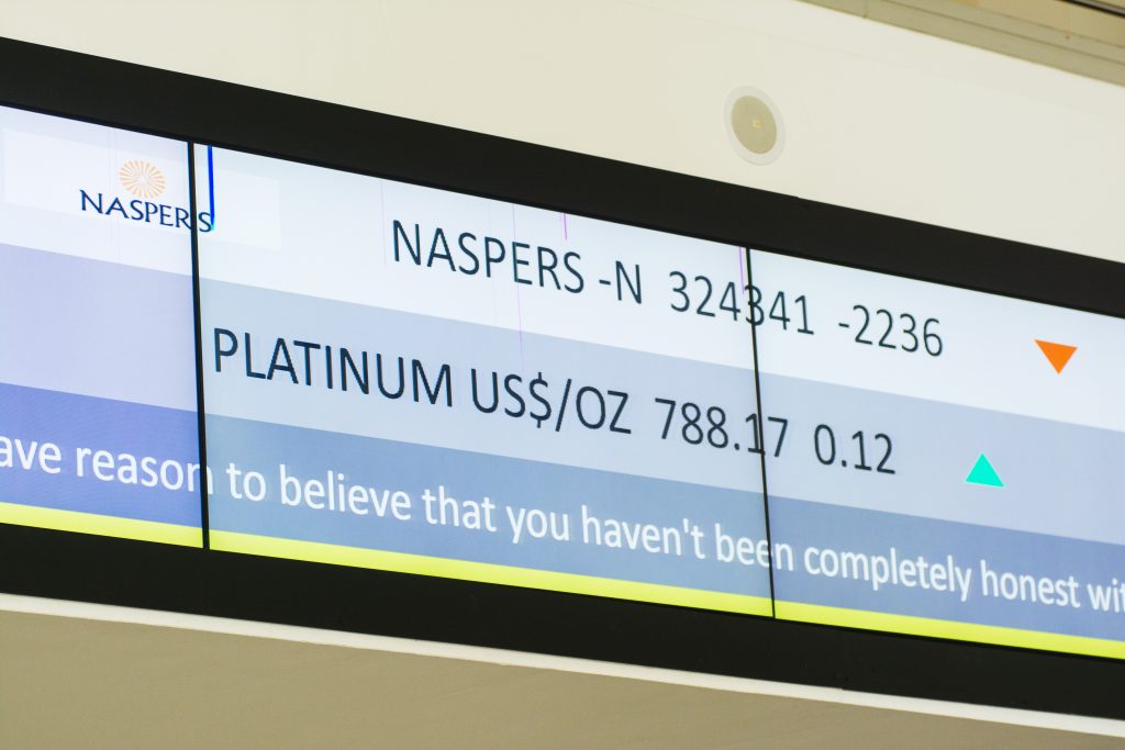 First-half profit at Naspers almost halves - Moneyweb