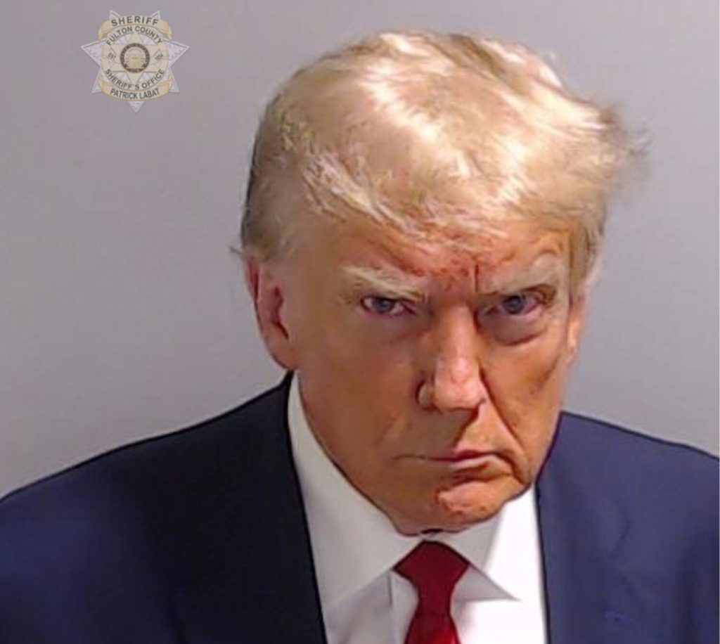 Donald Trump gets a mug shot after charges in Atlanta - Moneyweb