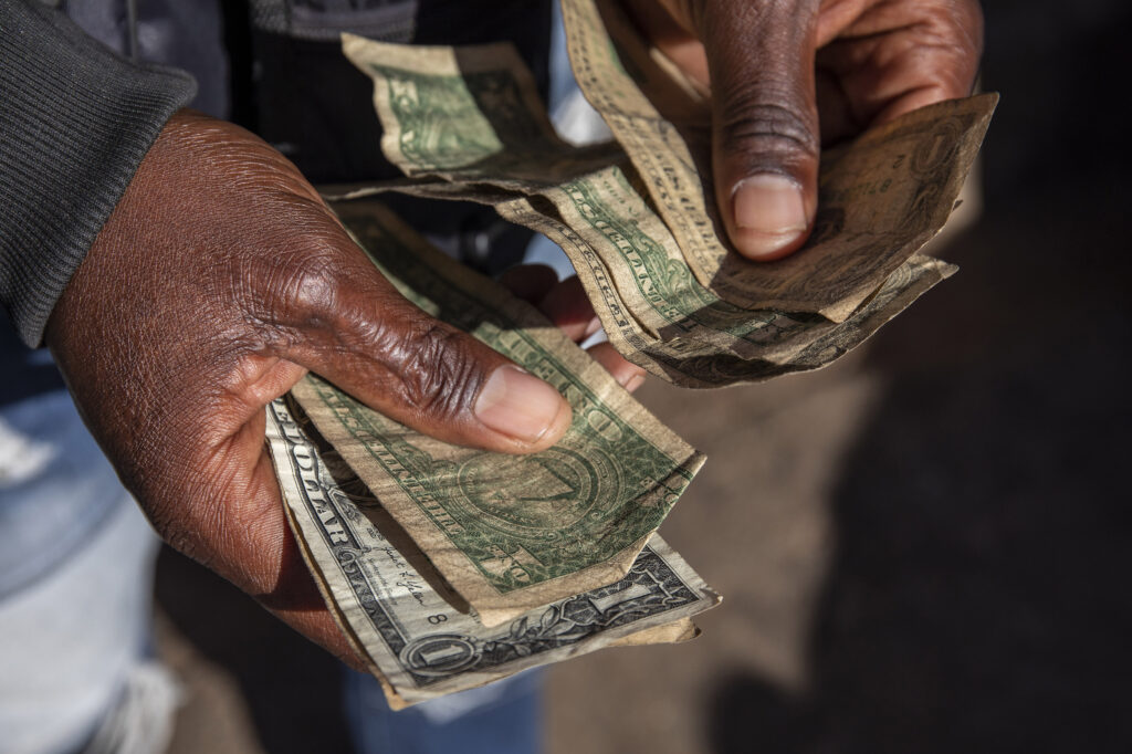 Fintechs fly planes of cash into Zimbabwe to meet demand for dollars ...