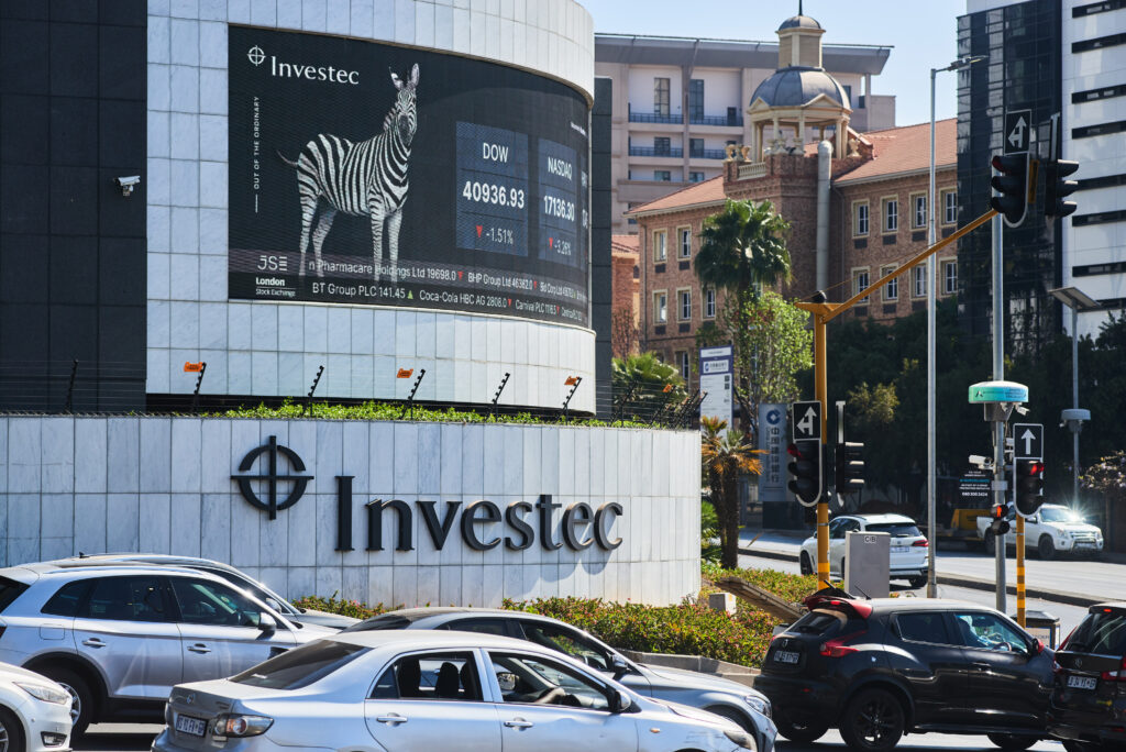 Investec posts record interim dividend as profits climb - Moneyweb