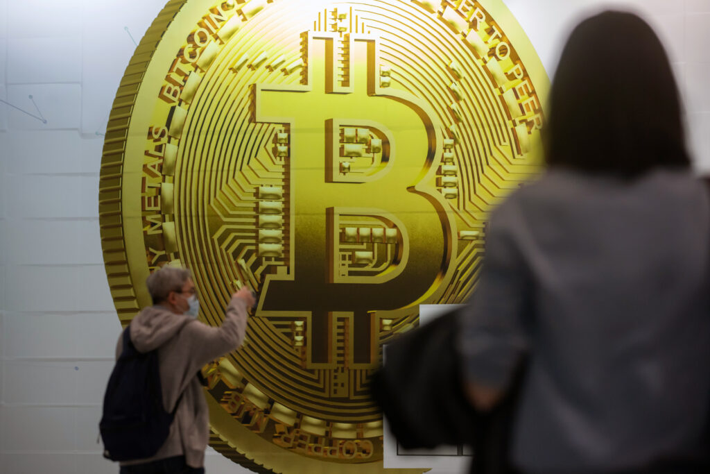 Bitcoin rises to record as investors snap up riskier assets - Moneyweb